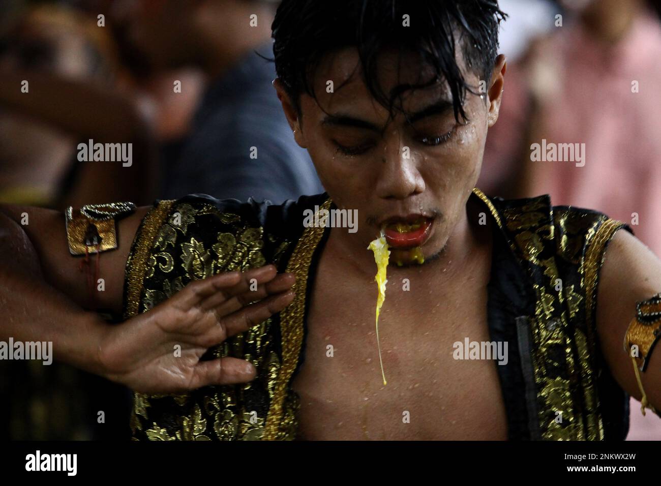 A dancer performs during the Kuda Lumping or locally known as "Jathilan ...