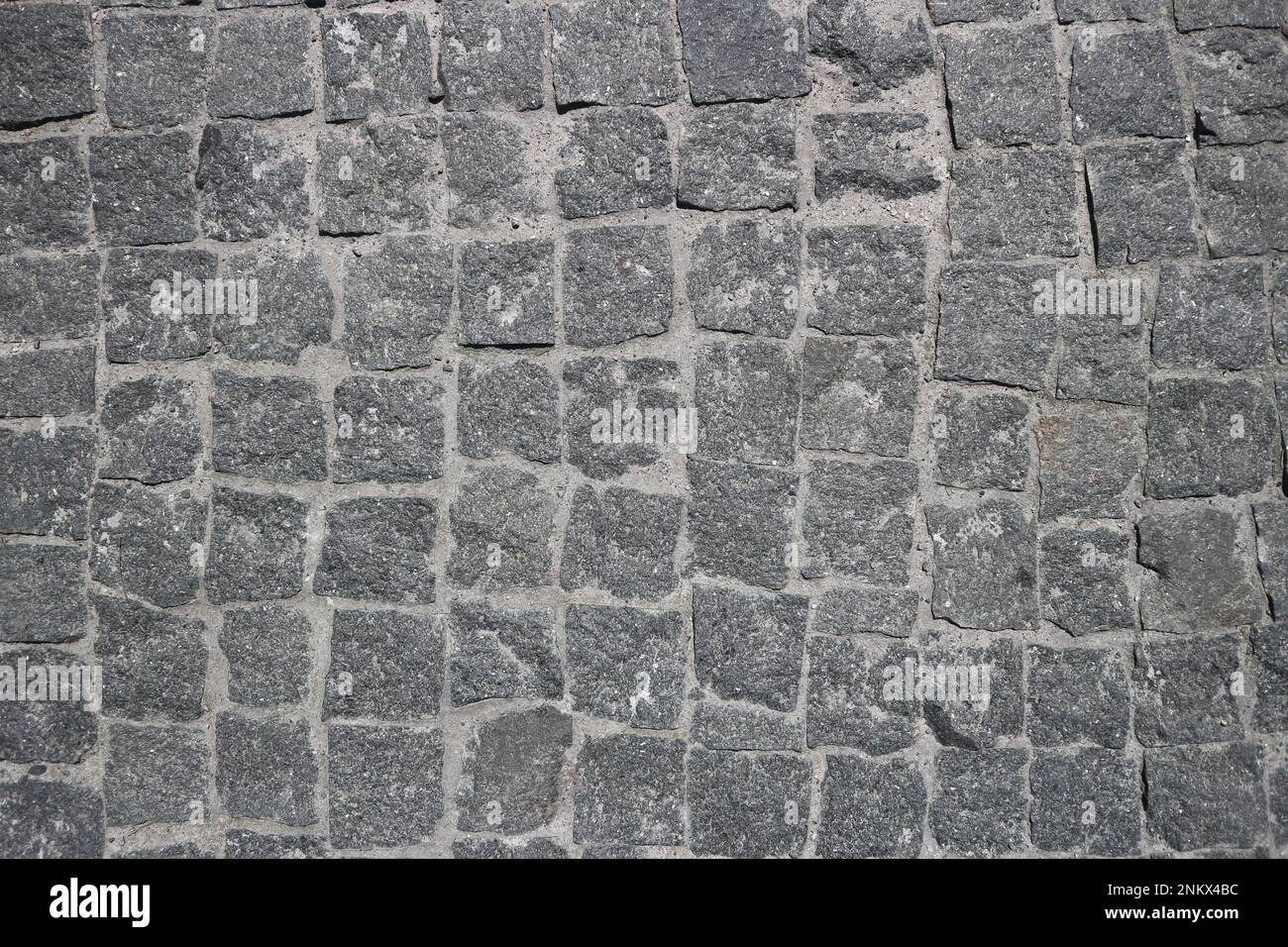 Rubble gray square stones paved road Stock Photo - Alamy