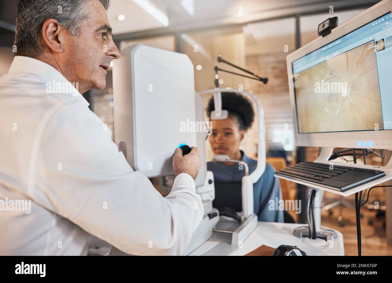 Computer, eye exam or black woman consulting doctor to help with ...
