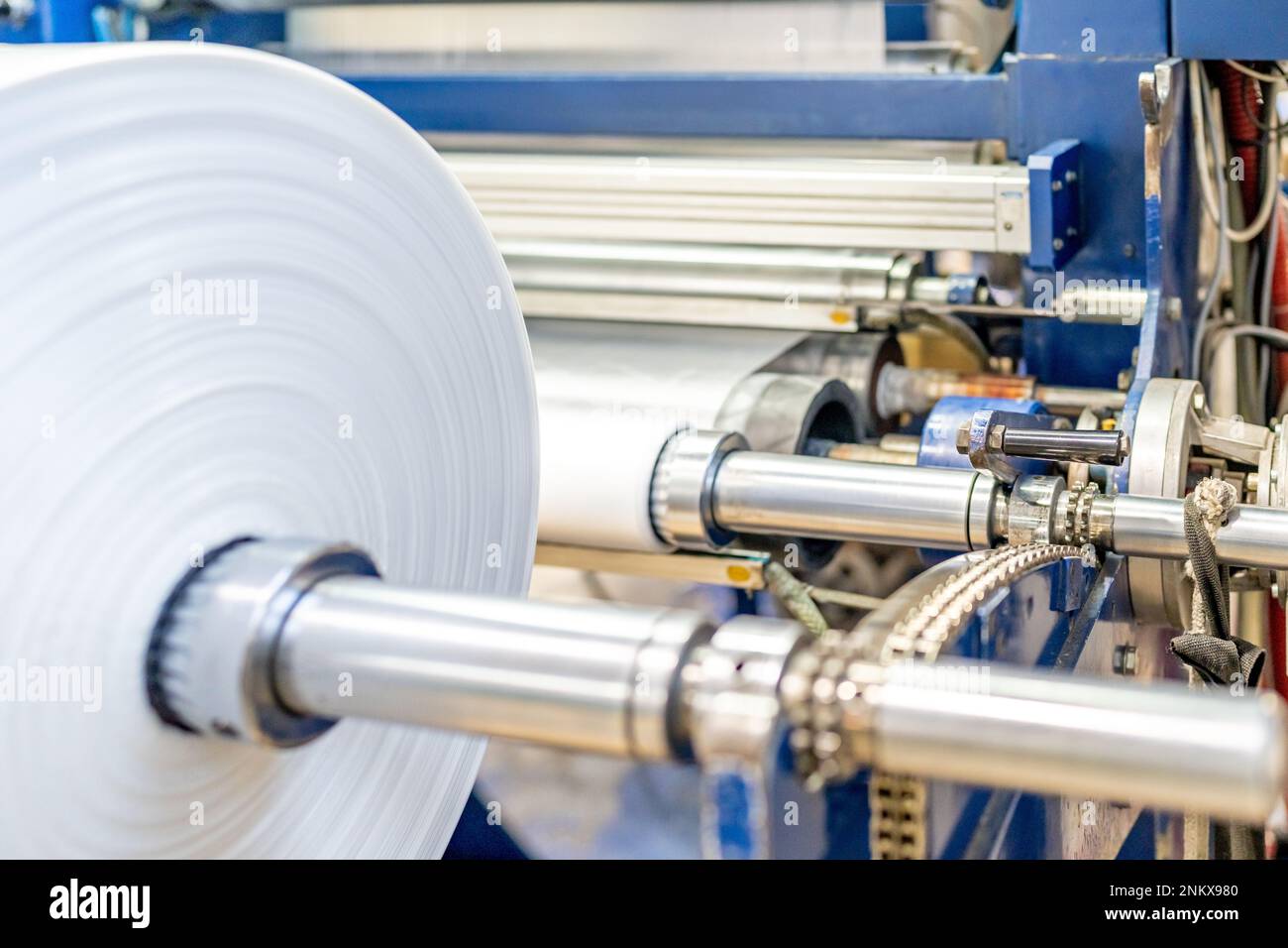 production of plastic packaging in a factory on an automated line Stock ...