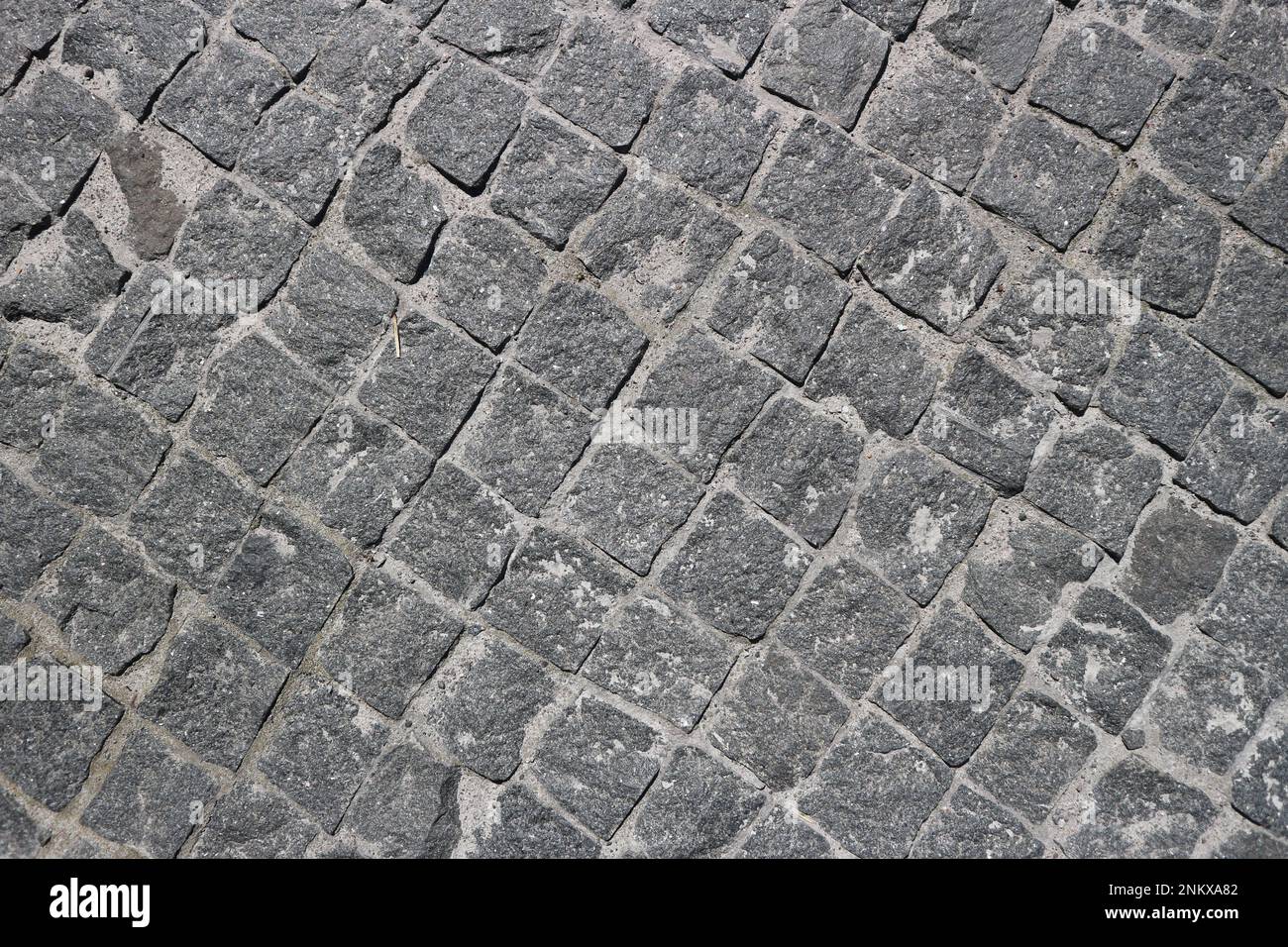 Rubble gray square stones paved road with a diagonal rotation Stock ...