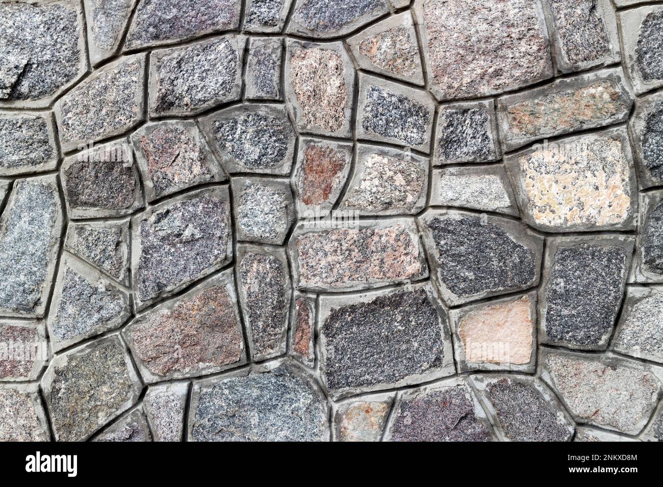 Rubble gray stone wall, rubblework Stock Photo - Alamy