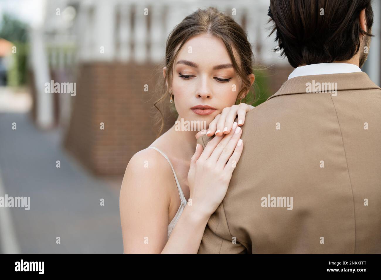 Bride leaning on shoulder hi-res stock photography and images - Alamy