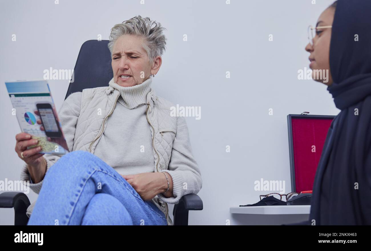 Eye test, optometry and senior woman reading document for examination ...