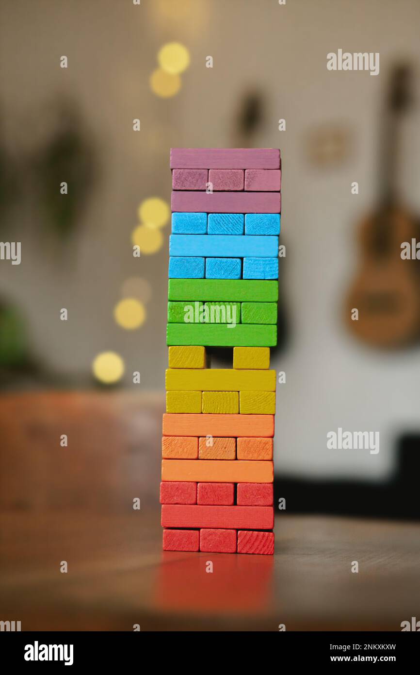 Wooden colored blocks of Jenga game. A board game, leisure activities ...