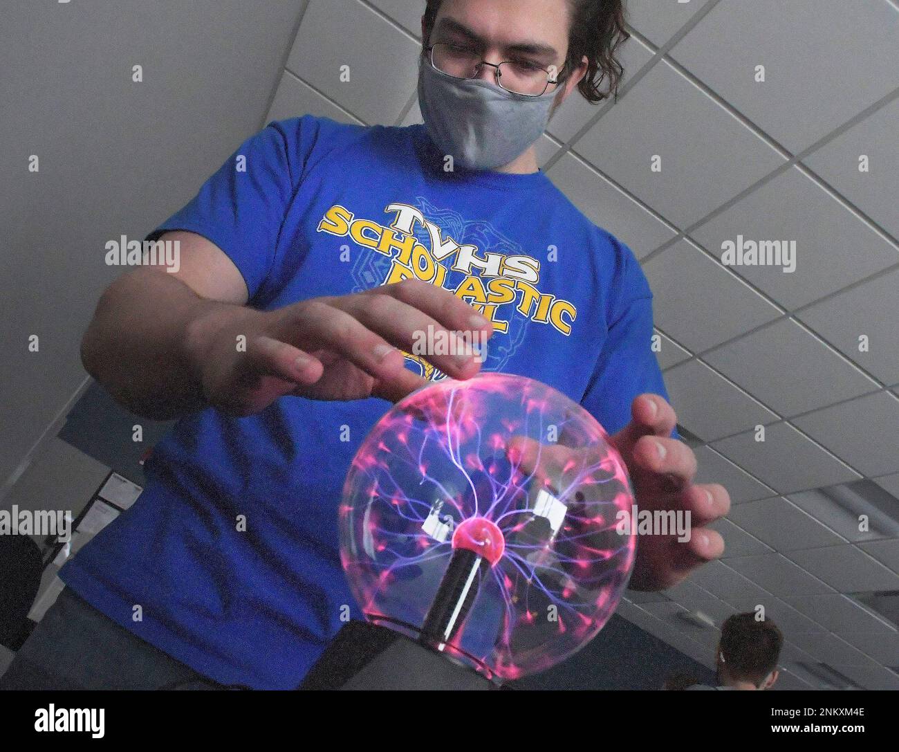 Tri-Valley High School senior River Wilson works with a plasma globe ...