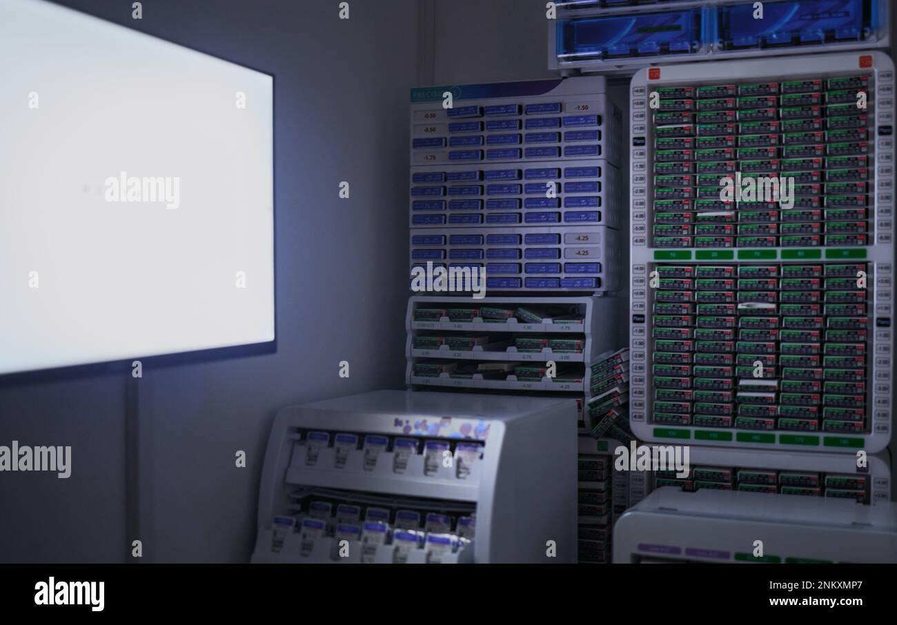 Optometry screen, vision or eyes test in dark empty room with mockup ...