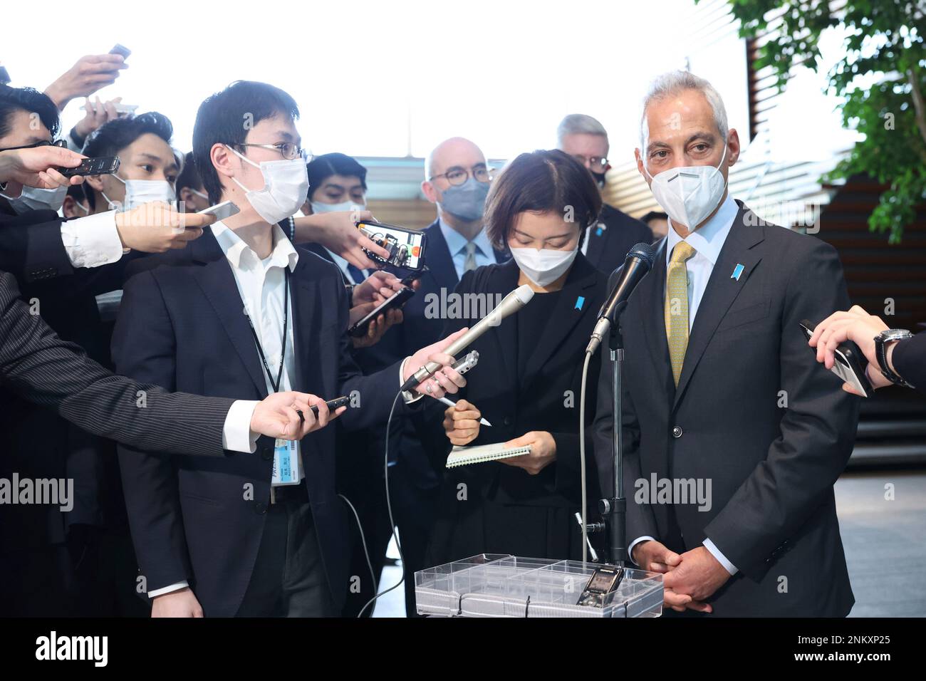 Rahm Emanuel (L), a new U.S. ambassador to Japan, speaks to reporters ...