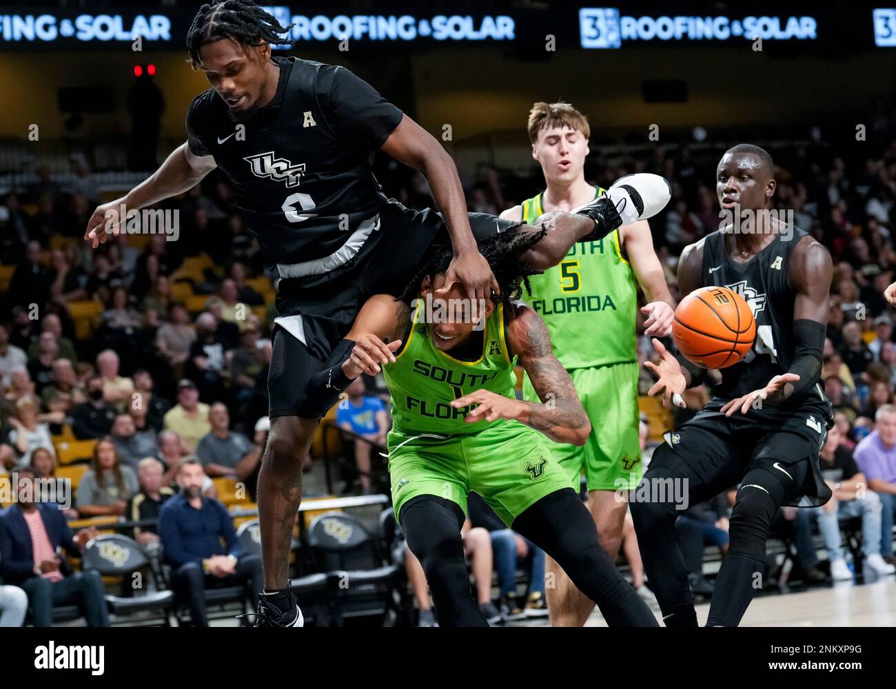 ORLANDO, FL - FEBRUARY 03: UCF Knights forward Isaiah Adams (3) crashes ...