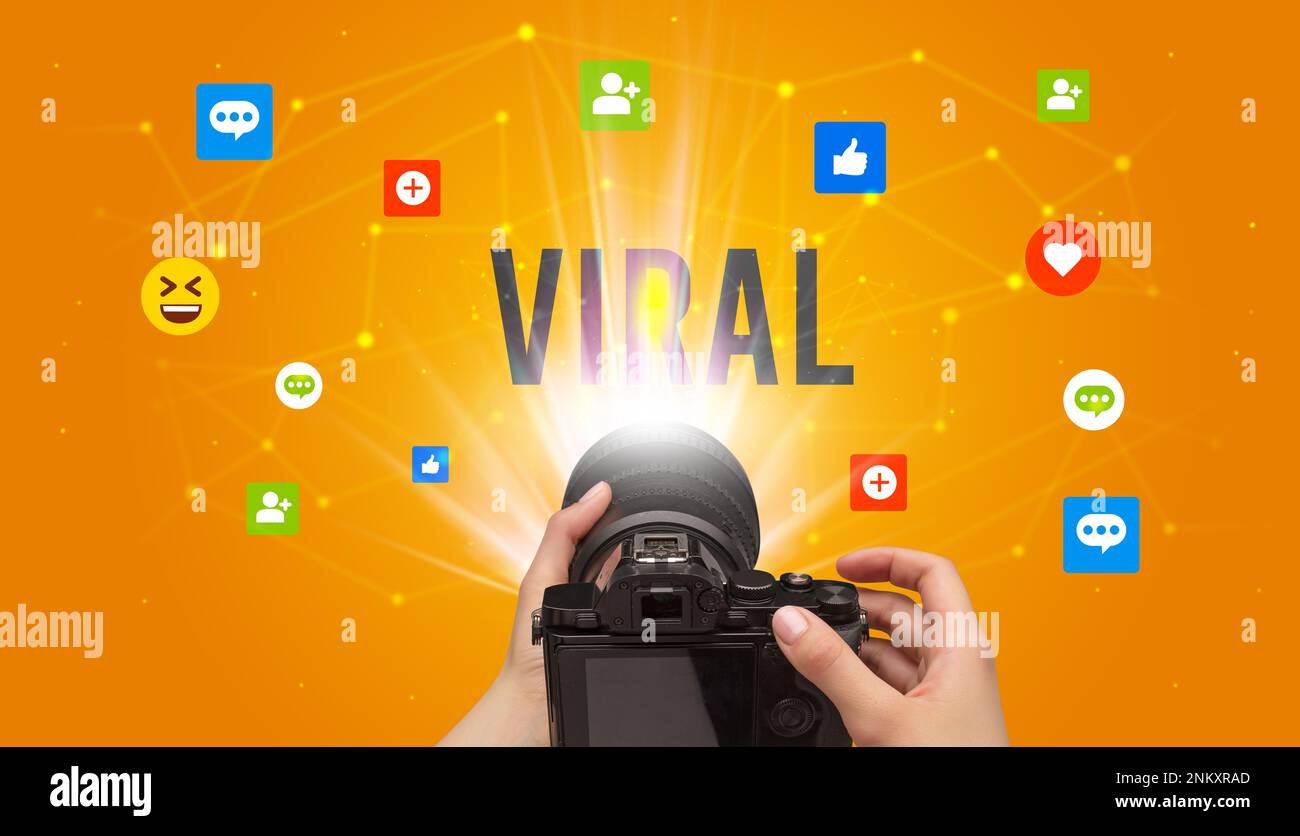Using camera to capture social media content Stock Photo - Alamy