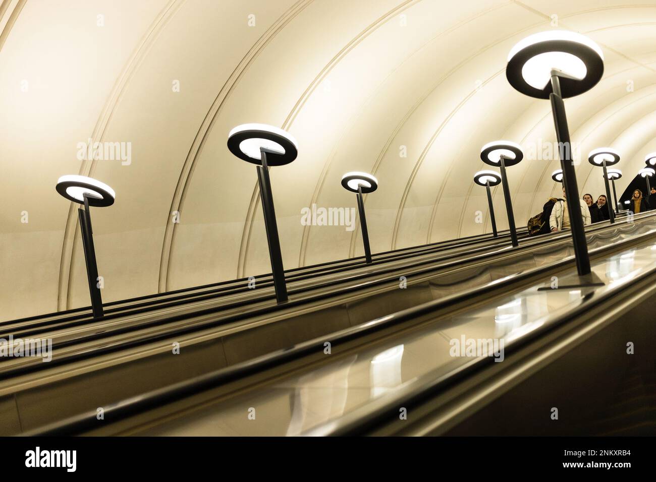 Moscow, Russia - February 22, 2023: long escalator with people of ...