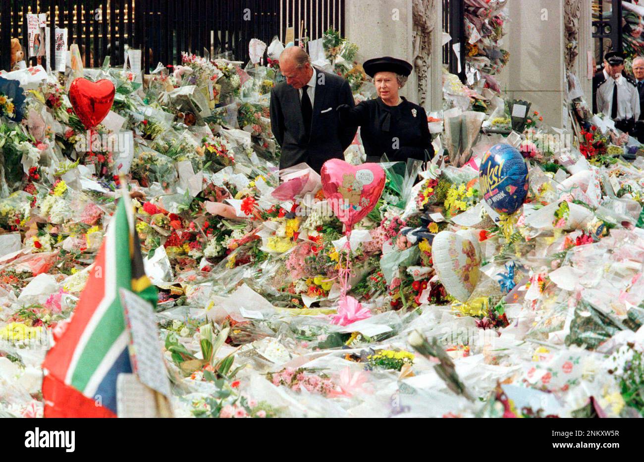 FILE - Britain's Queen Elizabeth II and Prince Philip view the floral ...