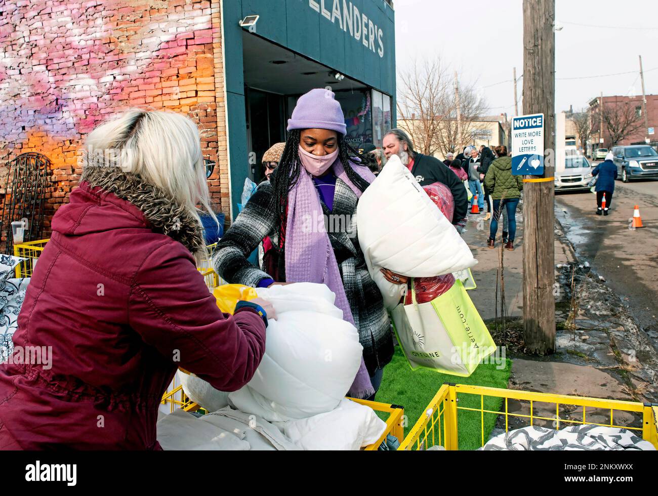 Lish Danielle, center, receives bedding from Gabbi Karsten Wednesday ...