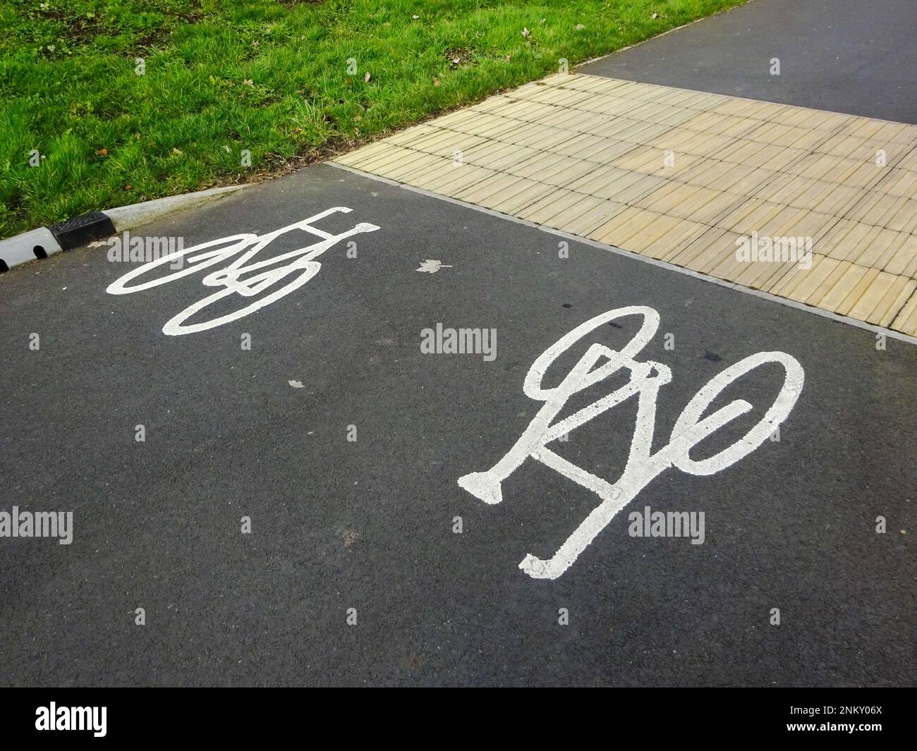 A closeup of bicycle signs on the road for bicycle riding lanes in ...