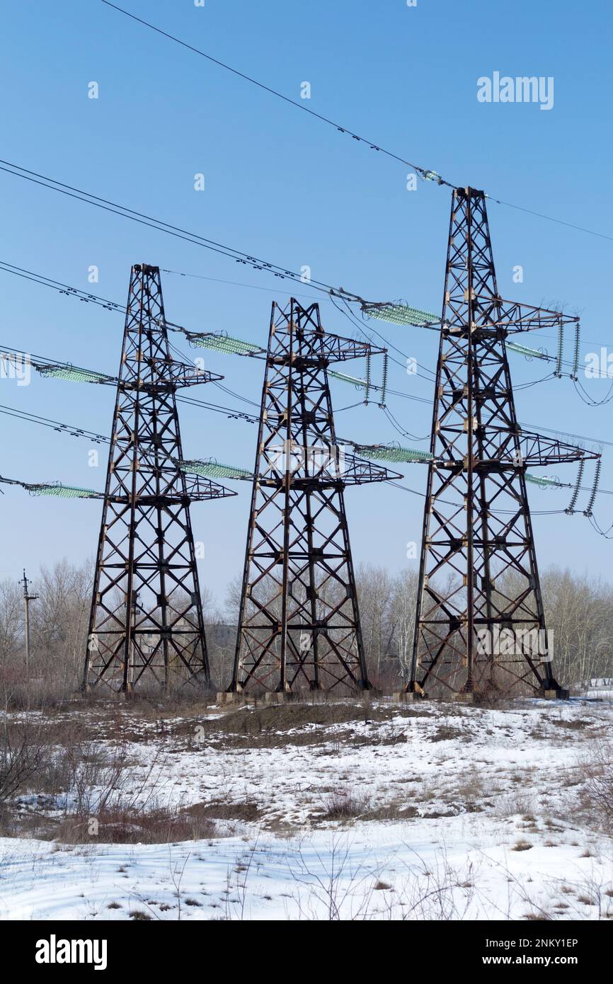 Three transmission electric towers with background of blue sky Stock ...