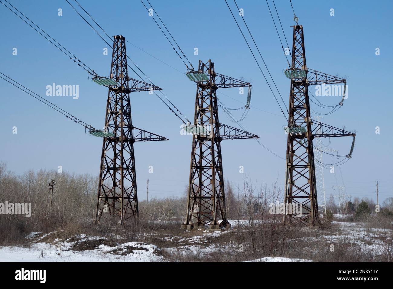 Three transmission electric towers with background of blue sky Stock ...
