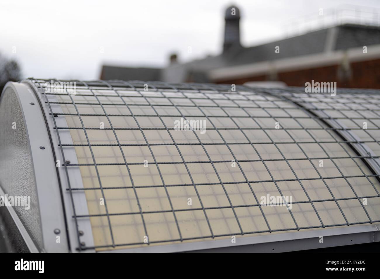 Barrel vault skylight screen fall protection guard installed on a ...