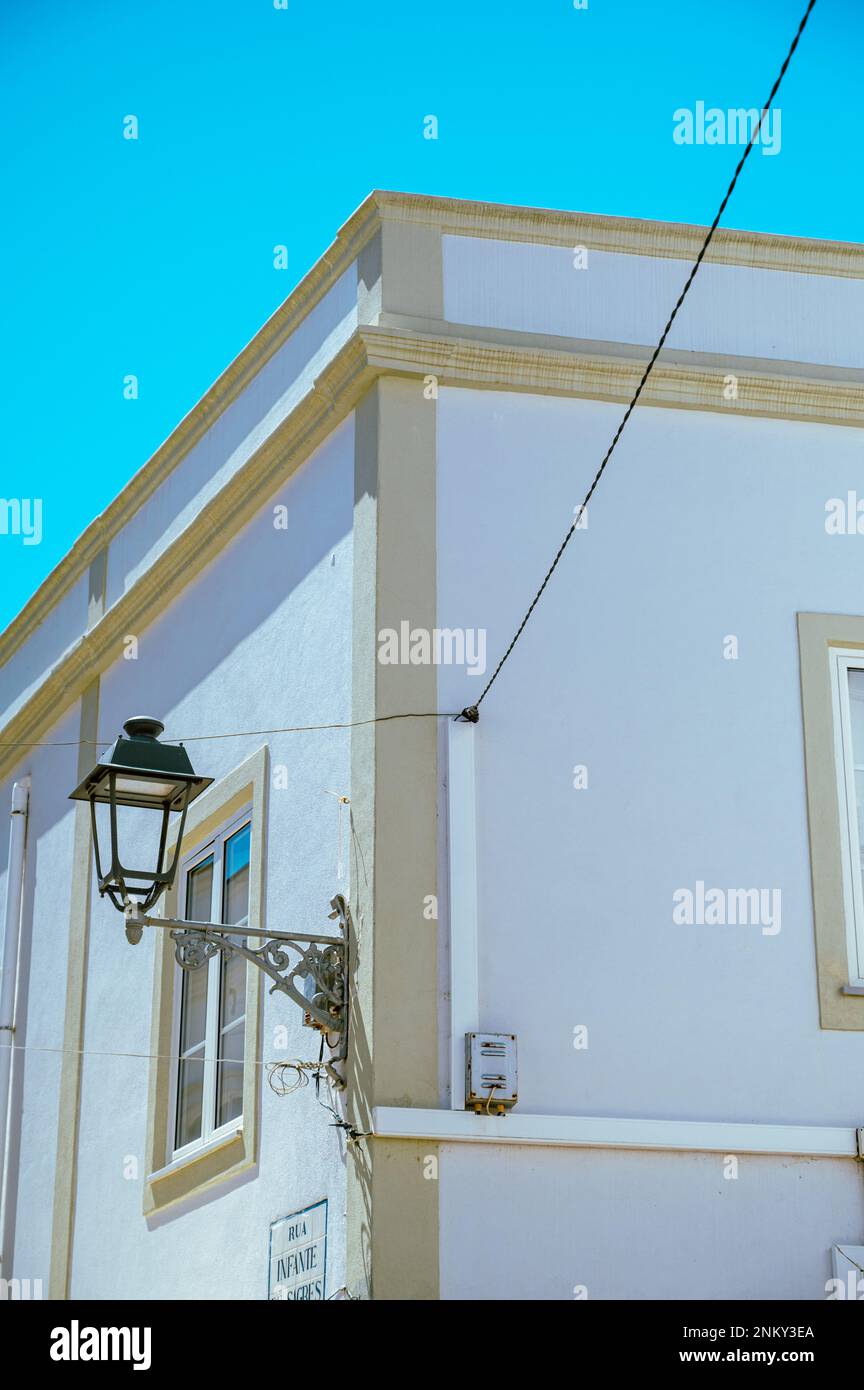 An old building painted white in Lagos Algarve Portugal showing the ...