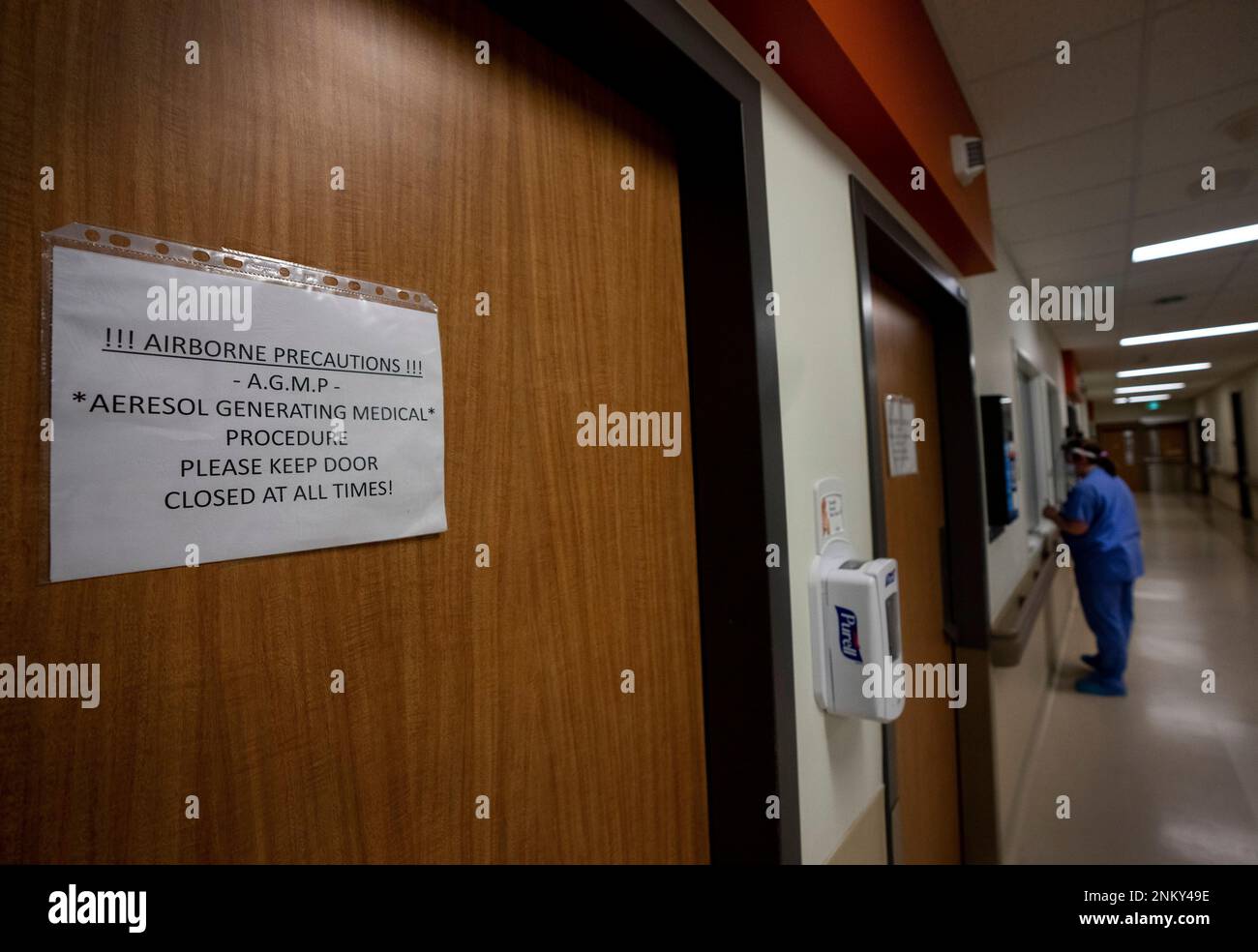 A precaution airborne sign is placed on doors reminding health-care ...