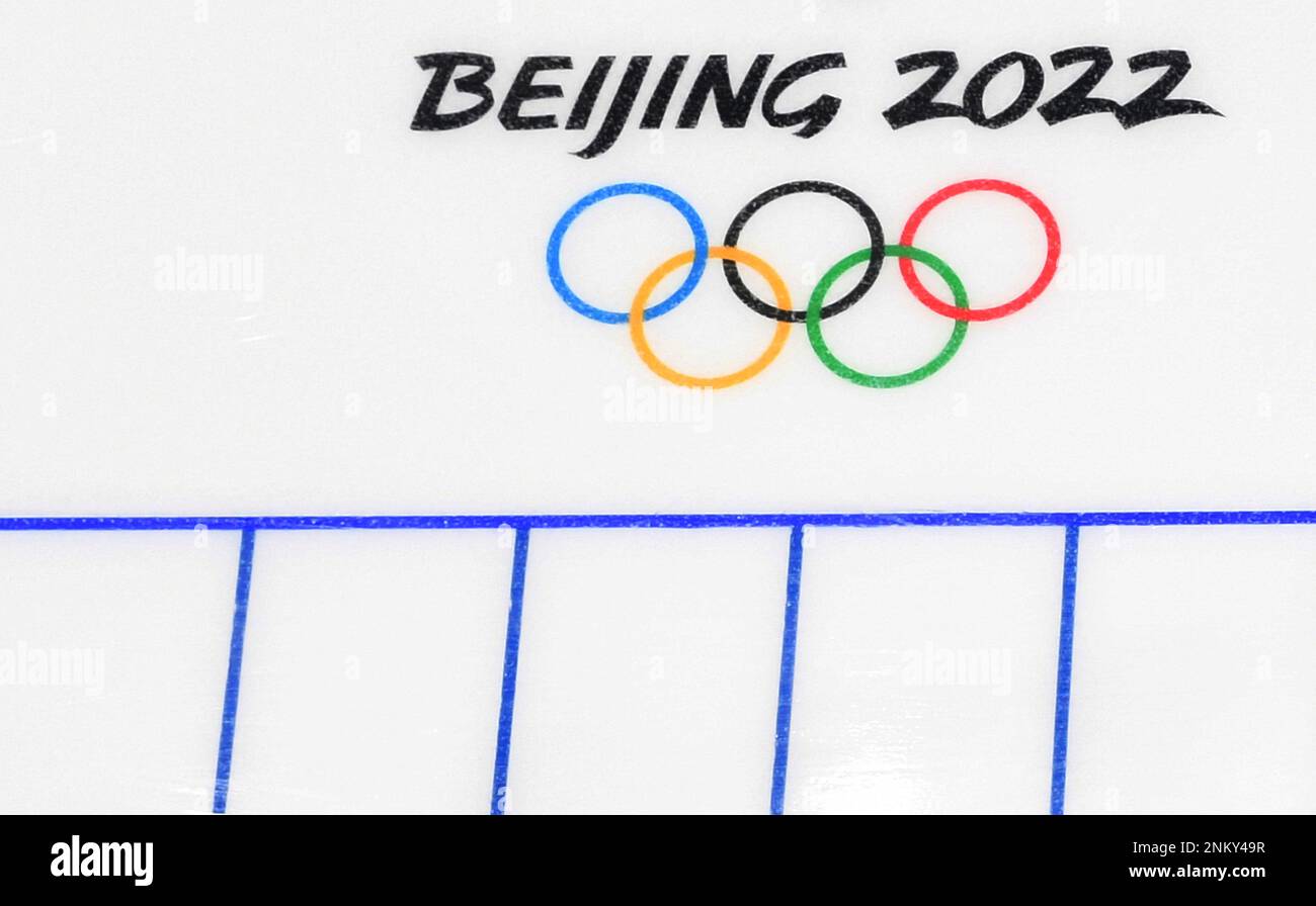 The five rings Olympic symbol mark is seen on the ice rink for speed ...