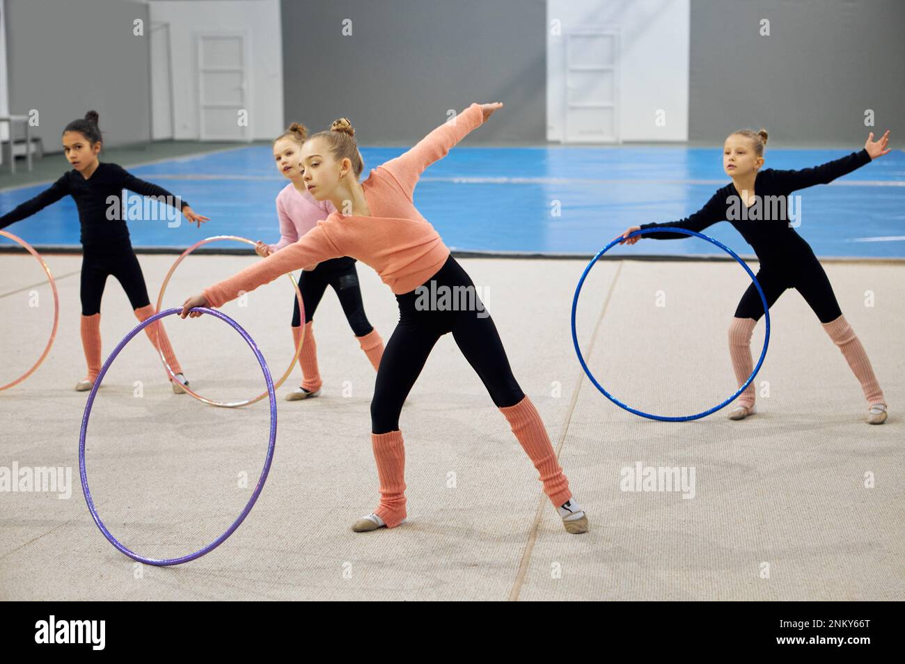 Competition preparation. Little girls, children, rhythmic gymnasts ...