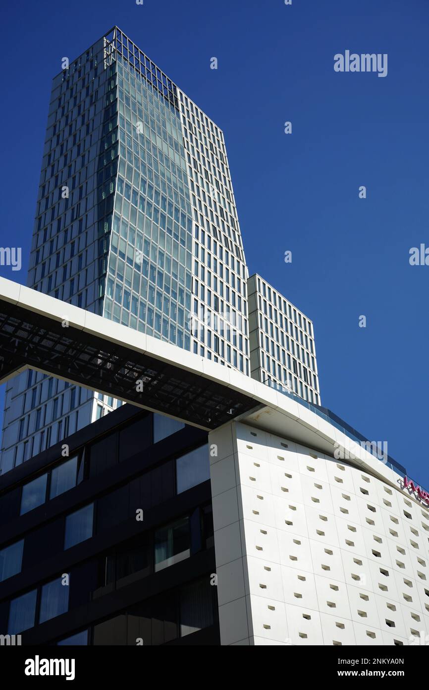 A modern architectural building with a sky backdrop and an attached ...