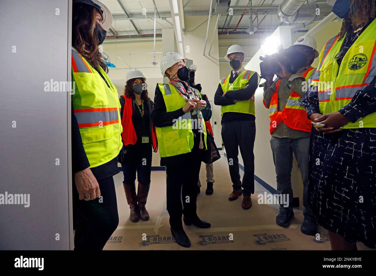 Luana Murphy, third from left, CEO of Exodus Recovery Inc. leads a tour ...