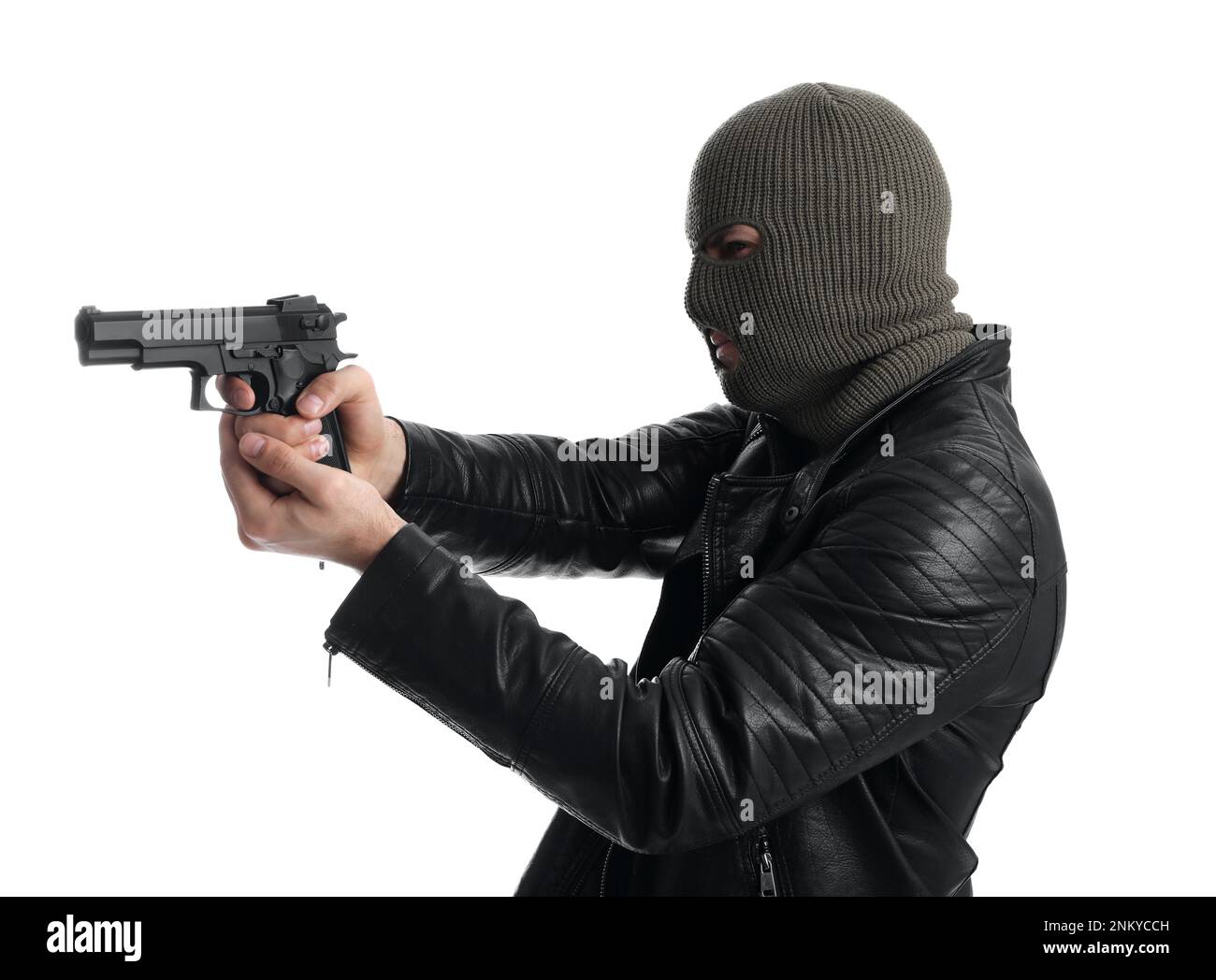 Man wearing knitted balaclava with gun on white background Stock Photo ...