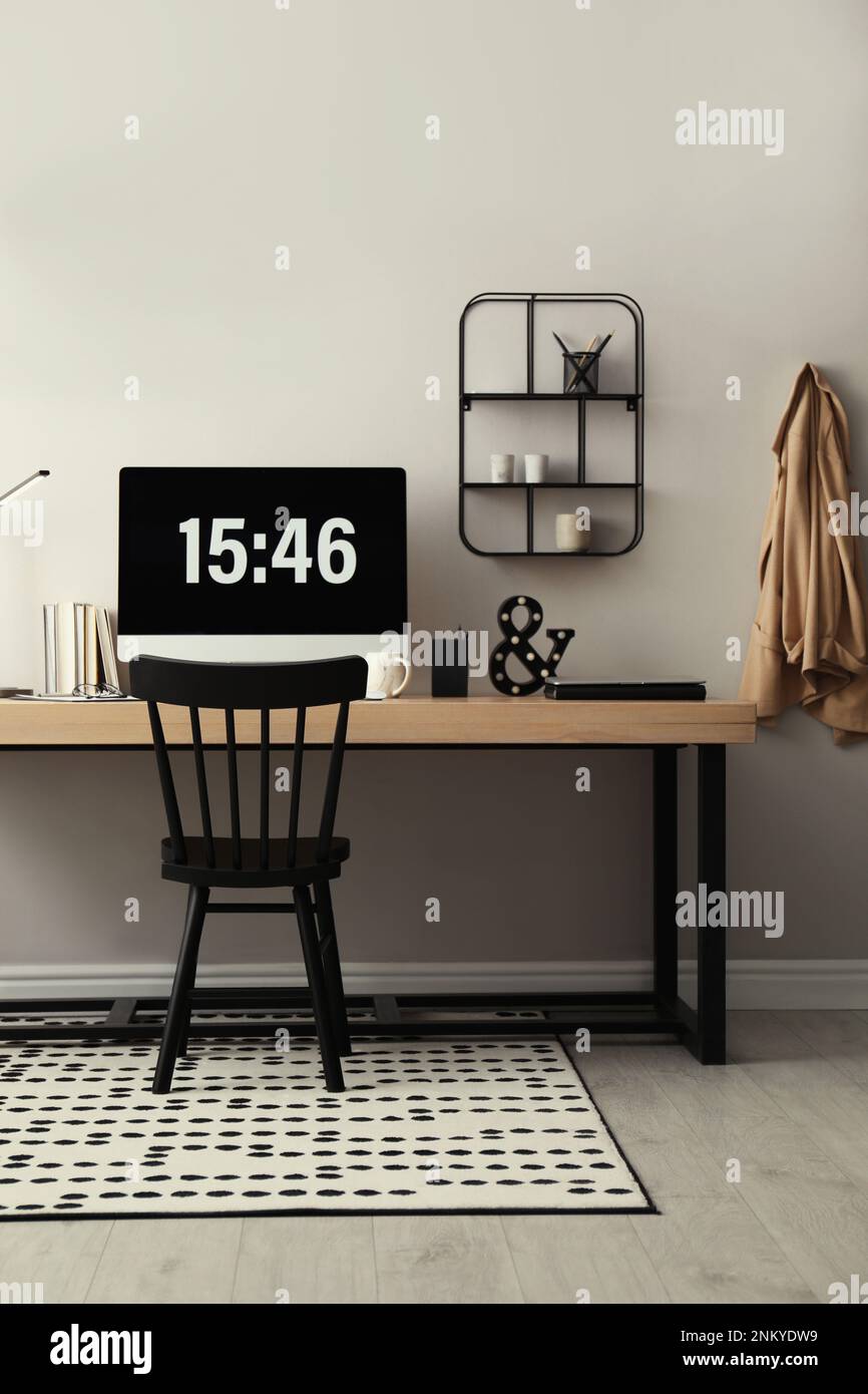 Modern workplace with computer in room. Interior design Stock Photo - Alamy