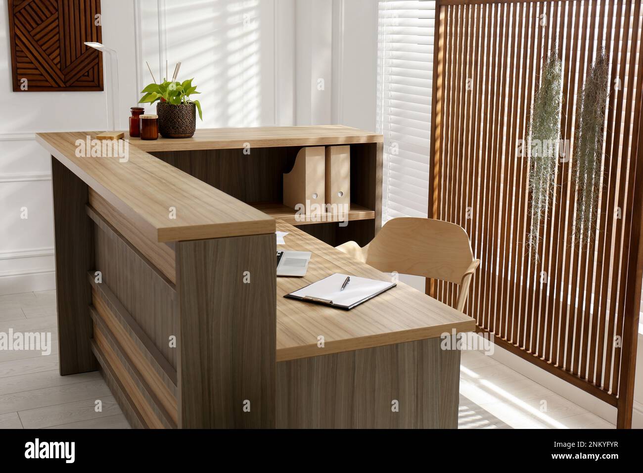 Receptionist's workplace with laptop in hotel. Interior design Stock ...