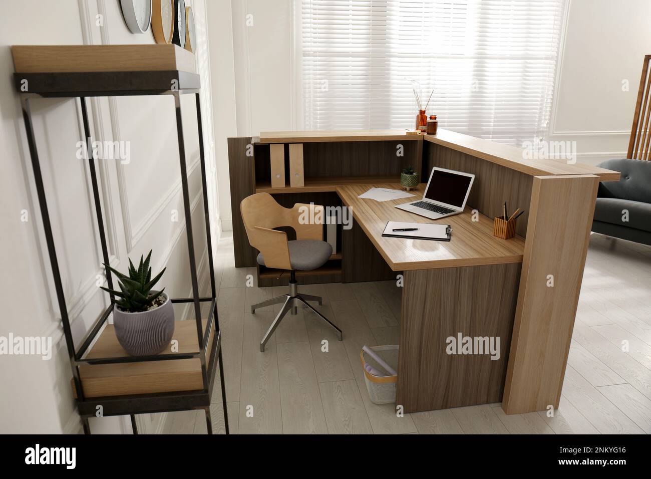 Receptionist's workplace with laptop in hotel. Interior design Stock ...