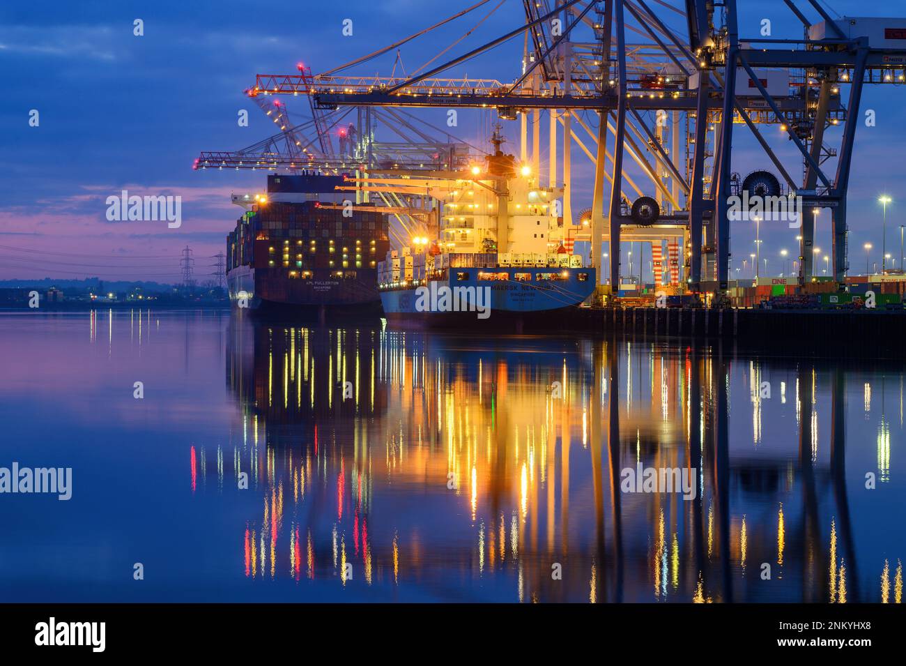 Night time view of container ship loading operations at the Port of ...