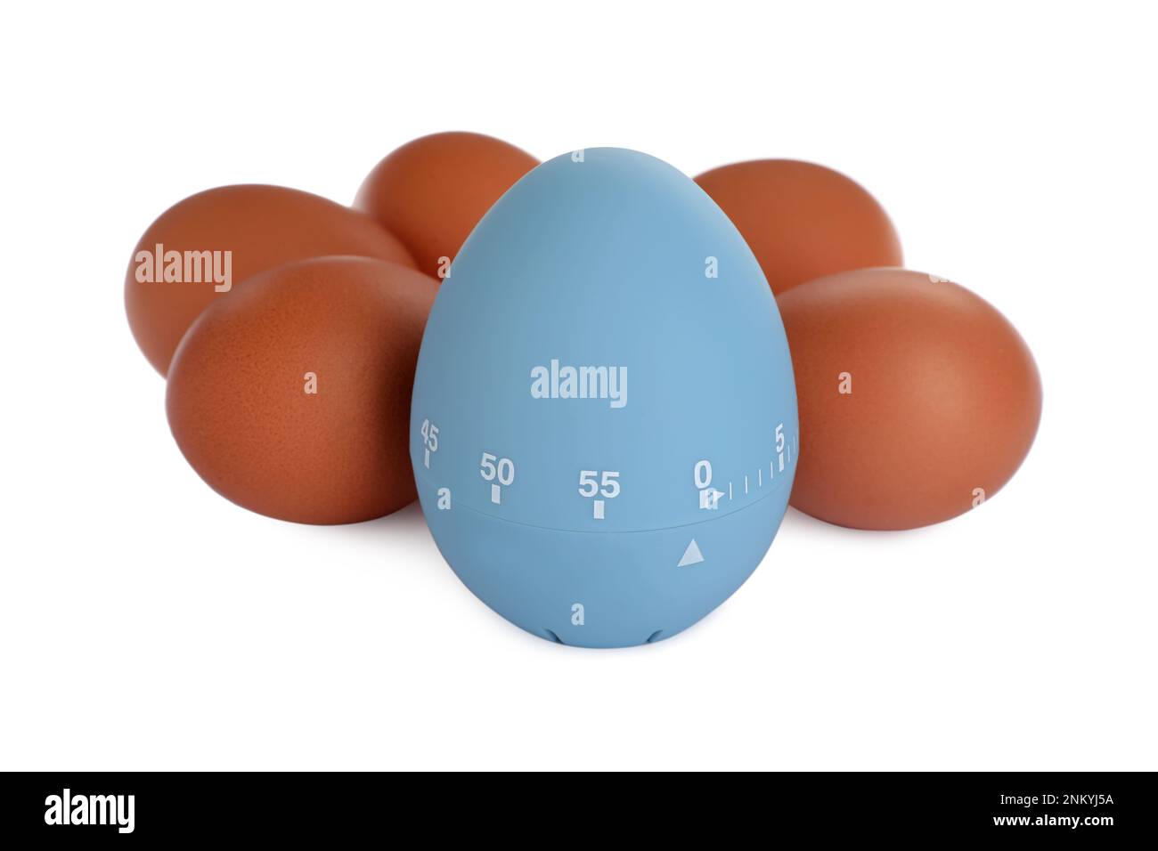 Kitchen timer and chicken eggs on white background Stock Photo - Alamy
