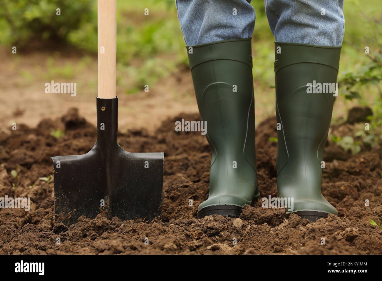 Rubber boots tool mud hi-res stock photography and images - Alamy