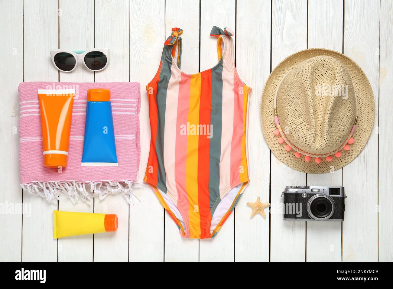 Different beach objects on white wooden background, flat lay Stock ...