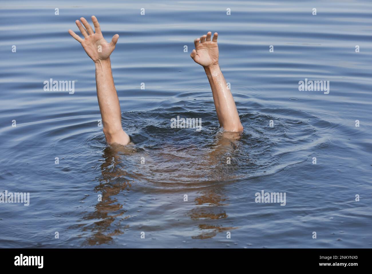 Drowning river hands hi-res stock photography and images - Alamy