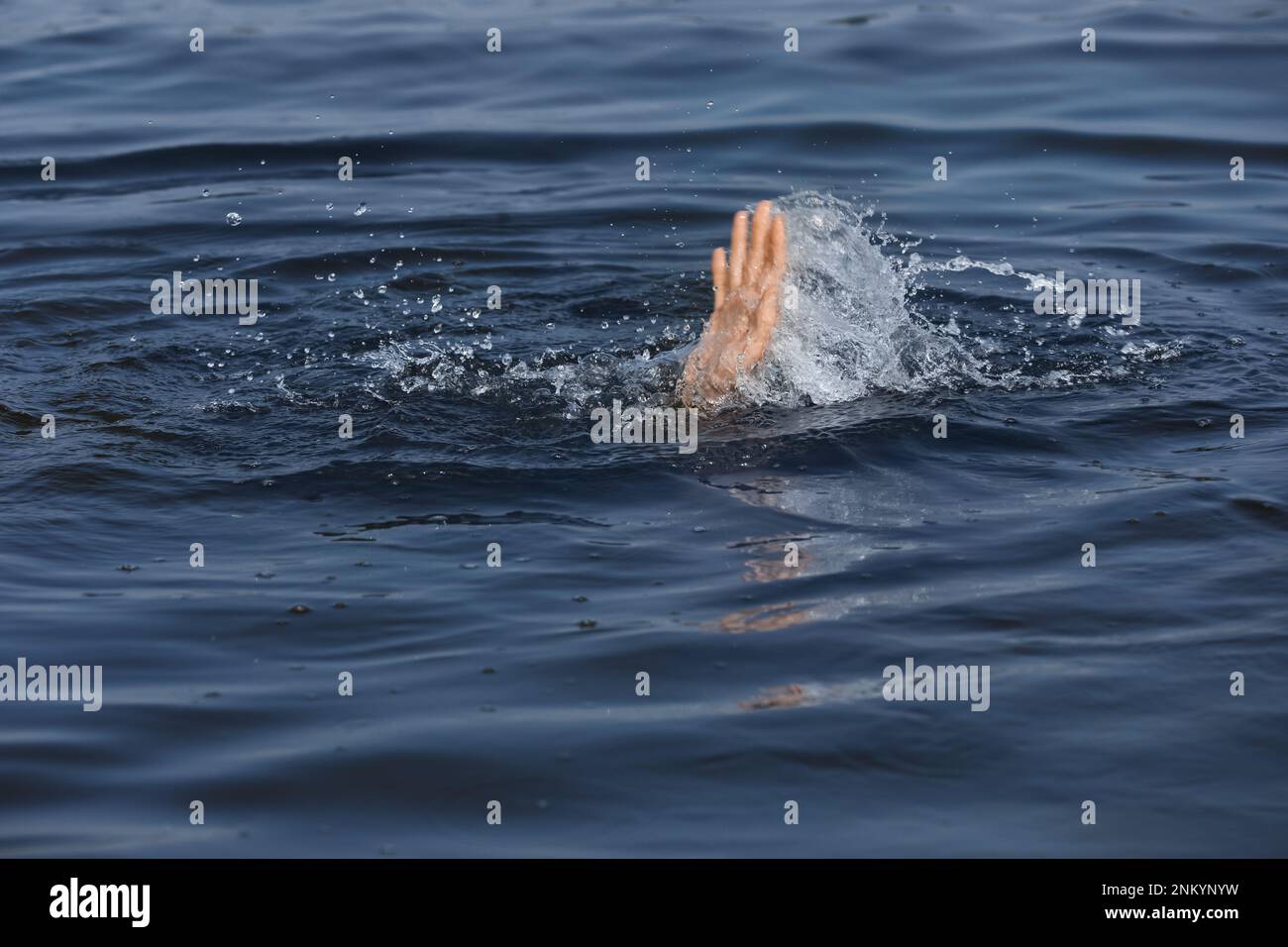 Drowning woman reaching for help in sea, closeup Stock Photo - Alamy