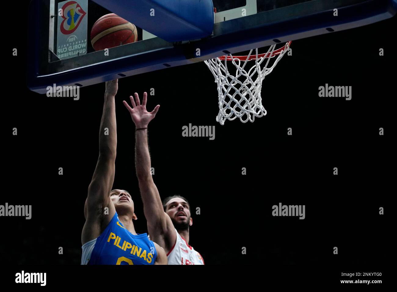 Philippines' Thirdy Ravena, left, against Lebanon's Gabriel Salibi ...