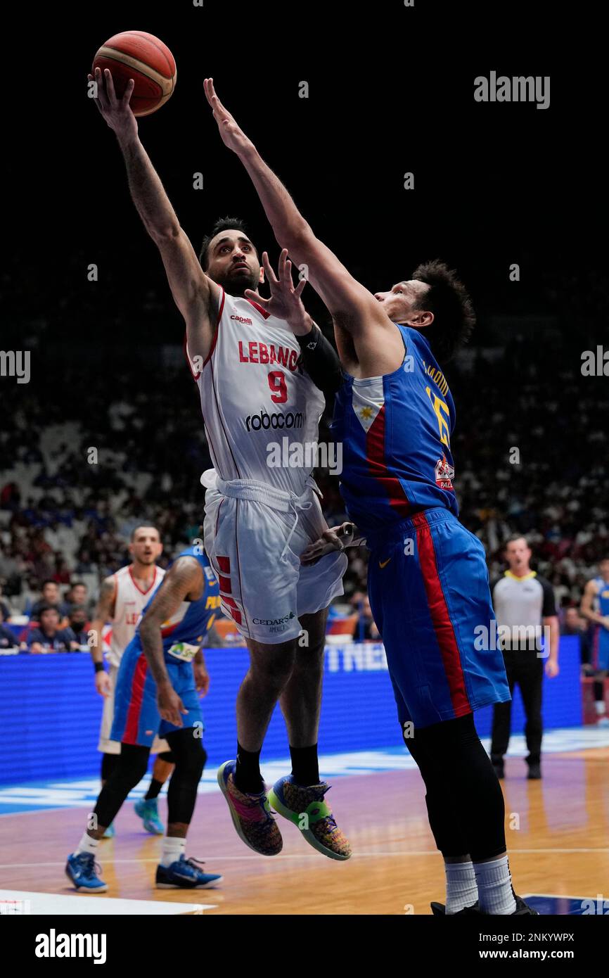 Lebanon's Amir Saoud, left, agaisnt Philippines' June Mar Fajardo ...