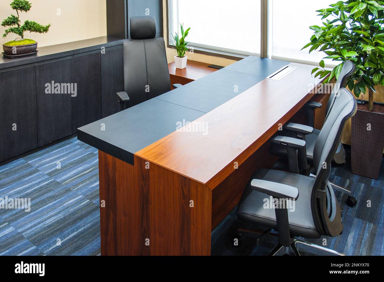 This is an interior office space featuring an office desk and chair ...