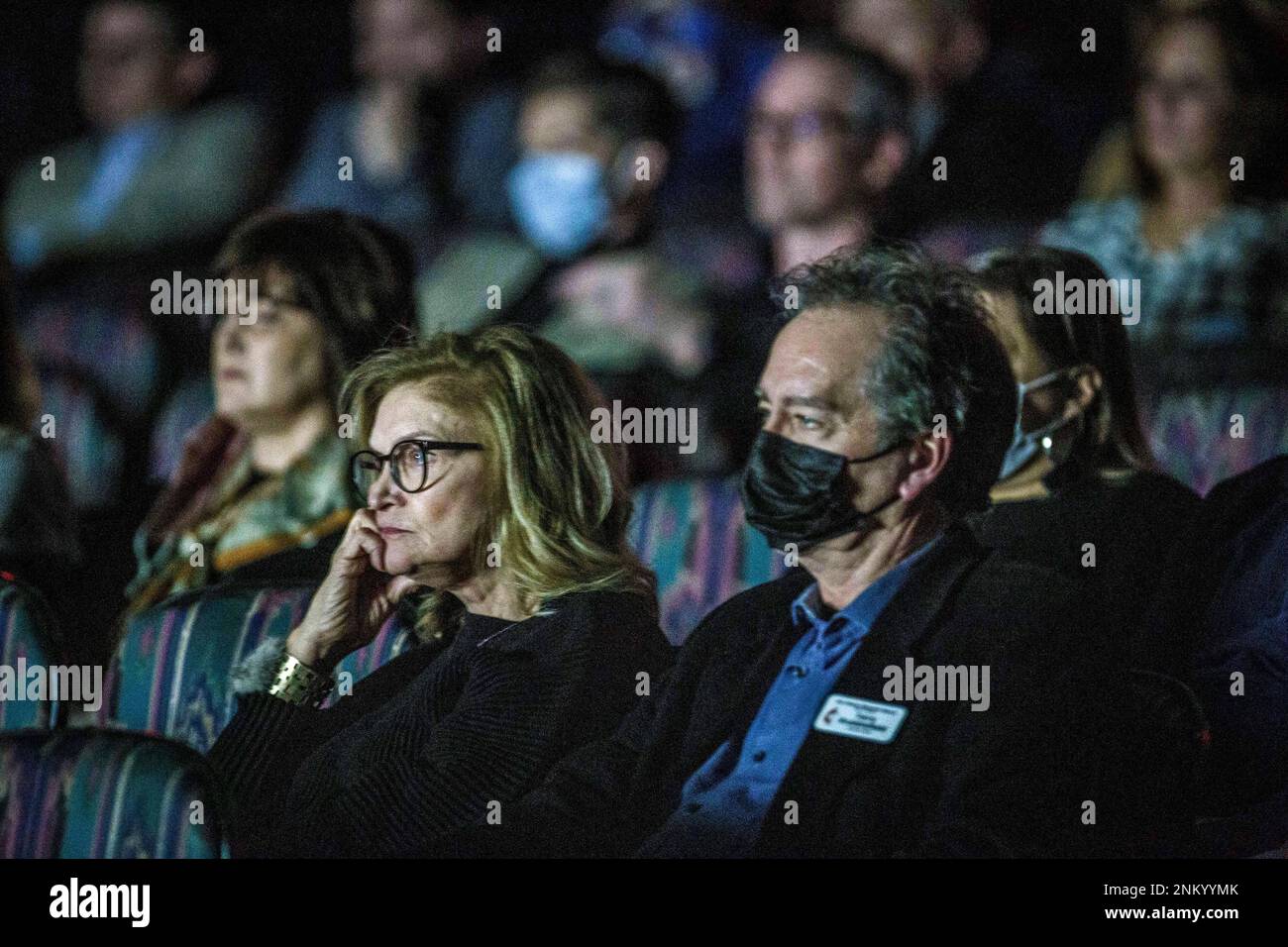 Guests listen as Travis Tatum, of Tatum Design, speaks about the city ...