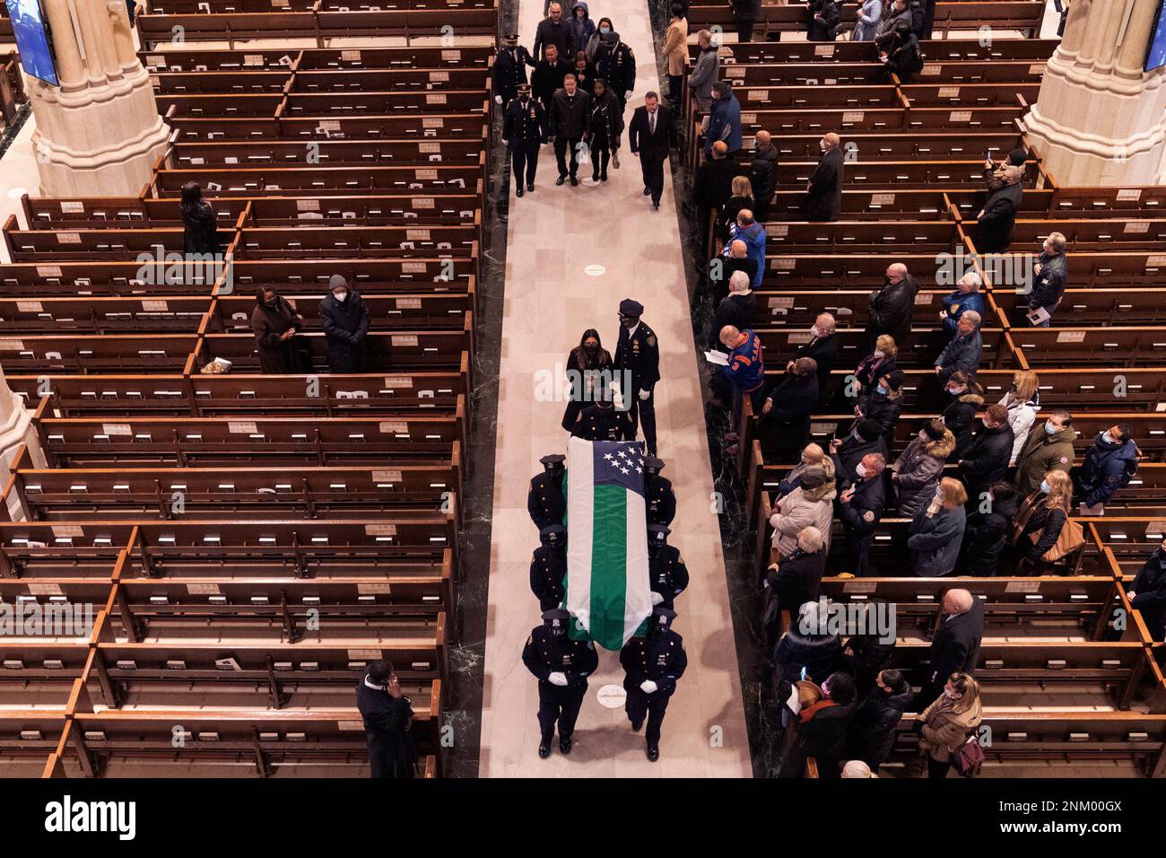 Family members of New York City Police Officer Jason Rivera follow as ...