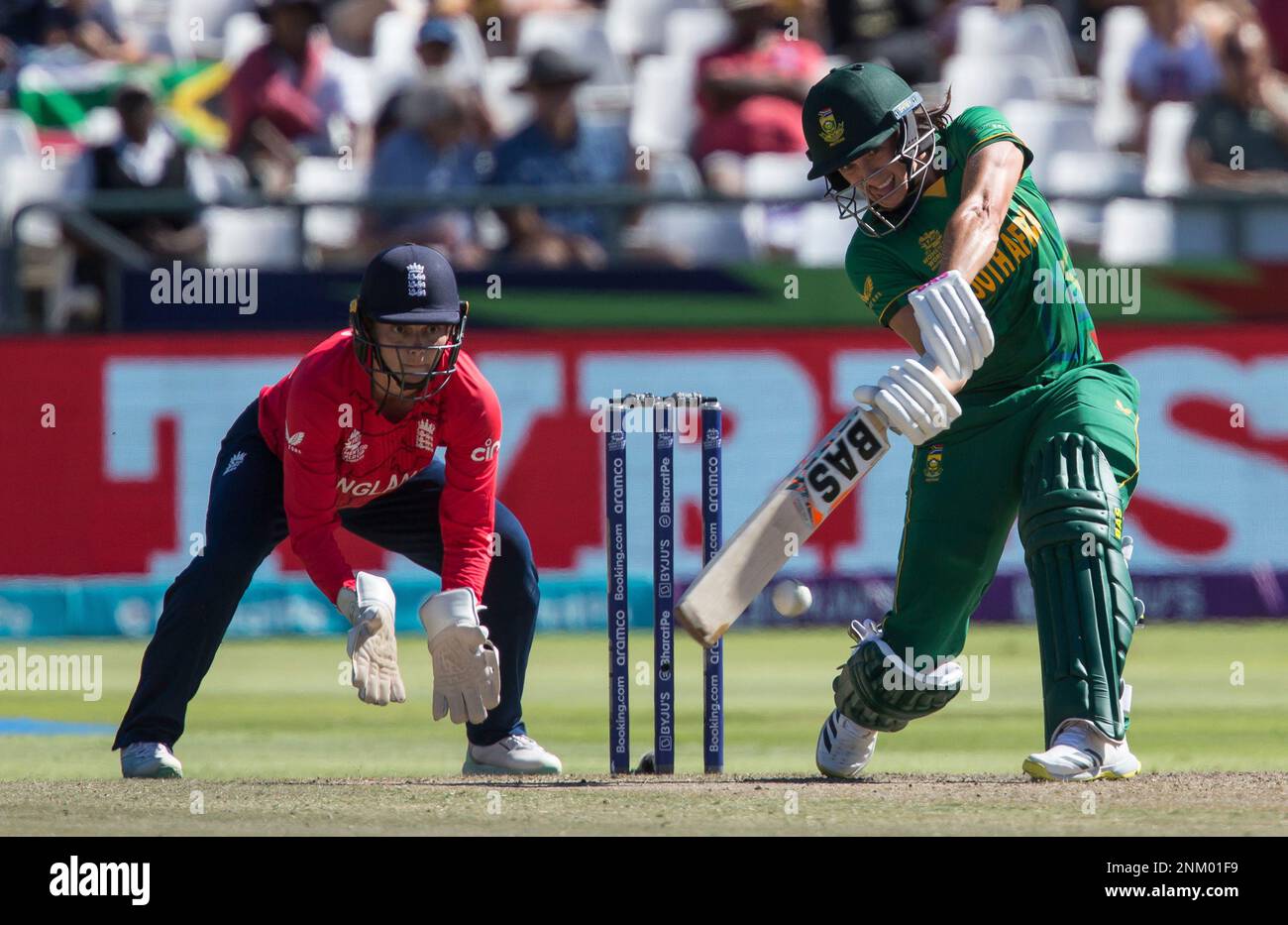 South Africa's Tazmin Brits, right, plays a shot while England's Amy ...