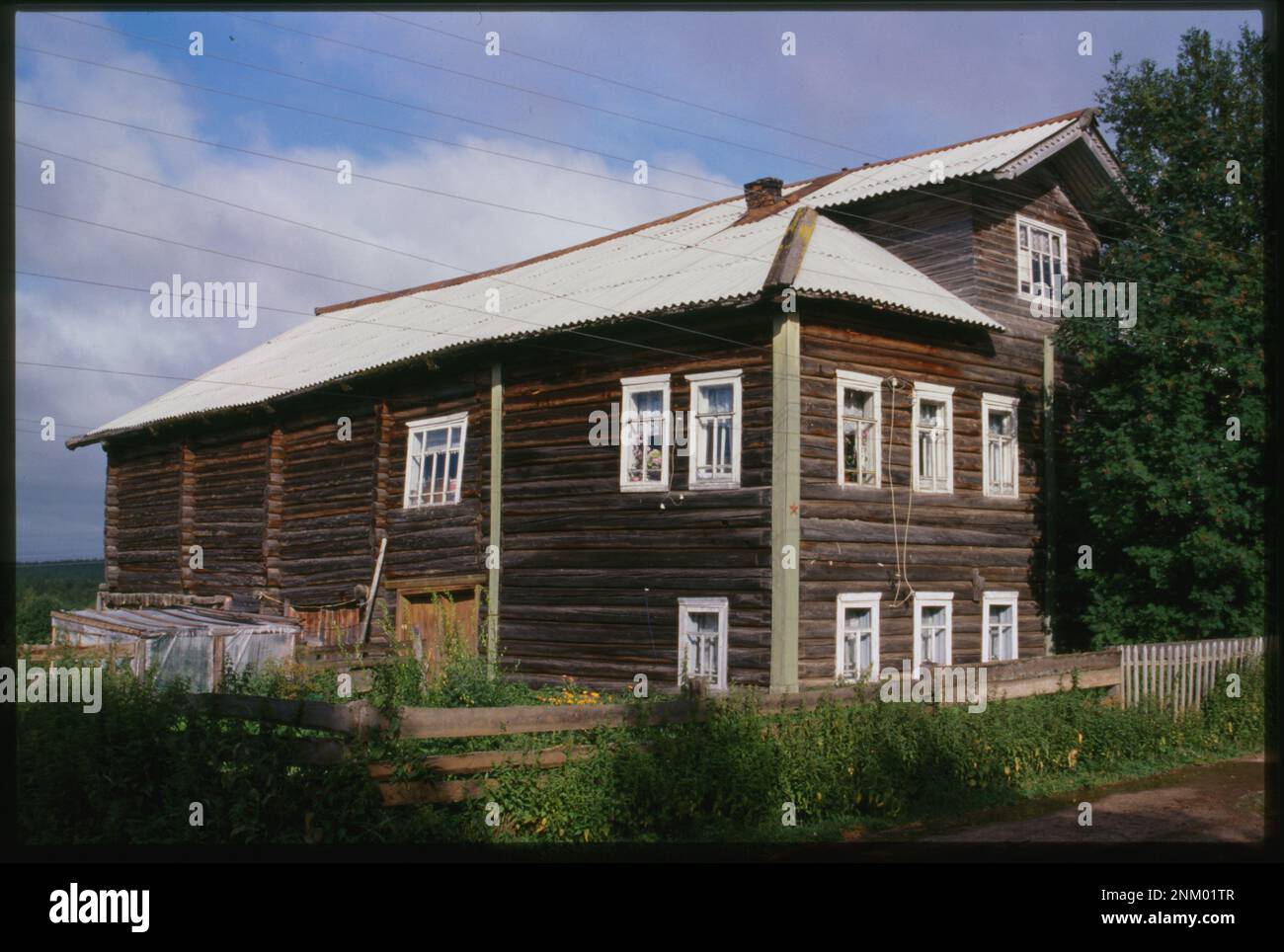 This early 20th-century log house, located in Kimzha, Russia, is a ...