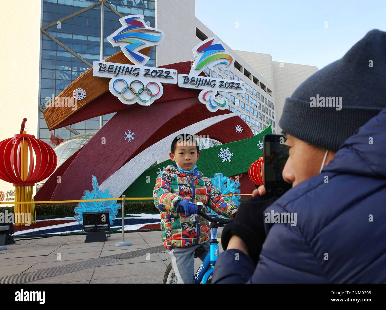 The Beijing Winter Olympic and Paralympic emblems are seen at a main ...