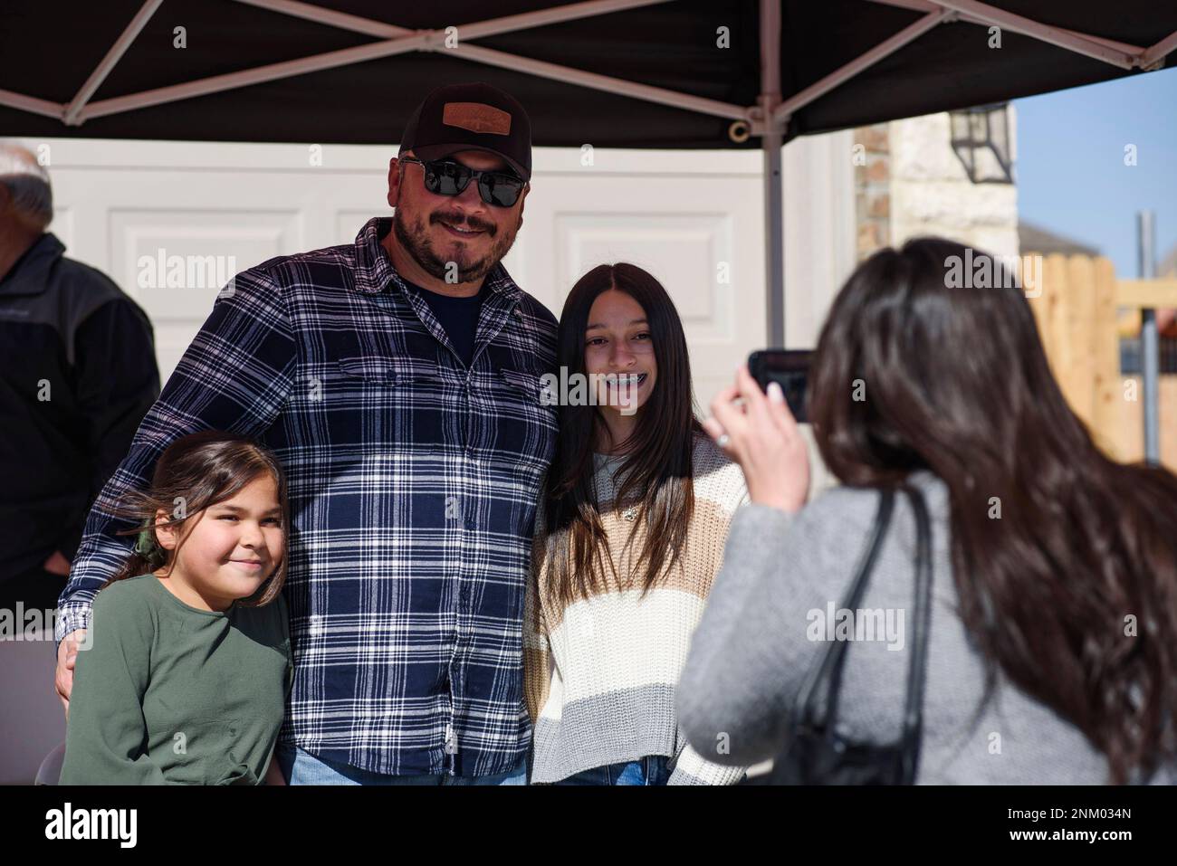 Disabled United States Marine Corps veteran Corporal Ray Lopez, center ...