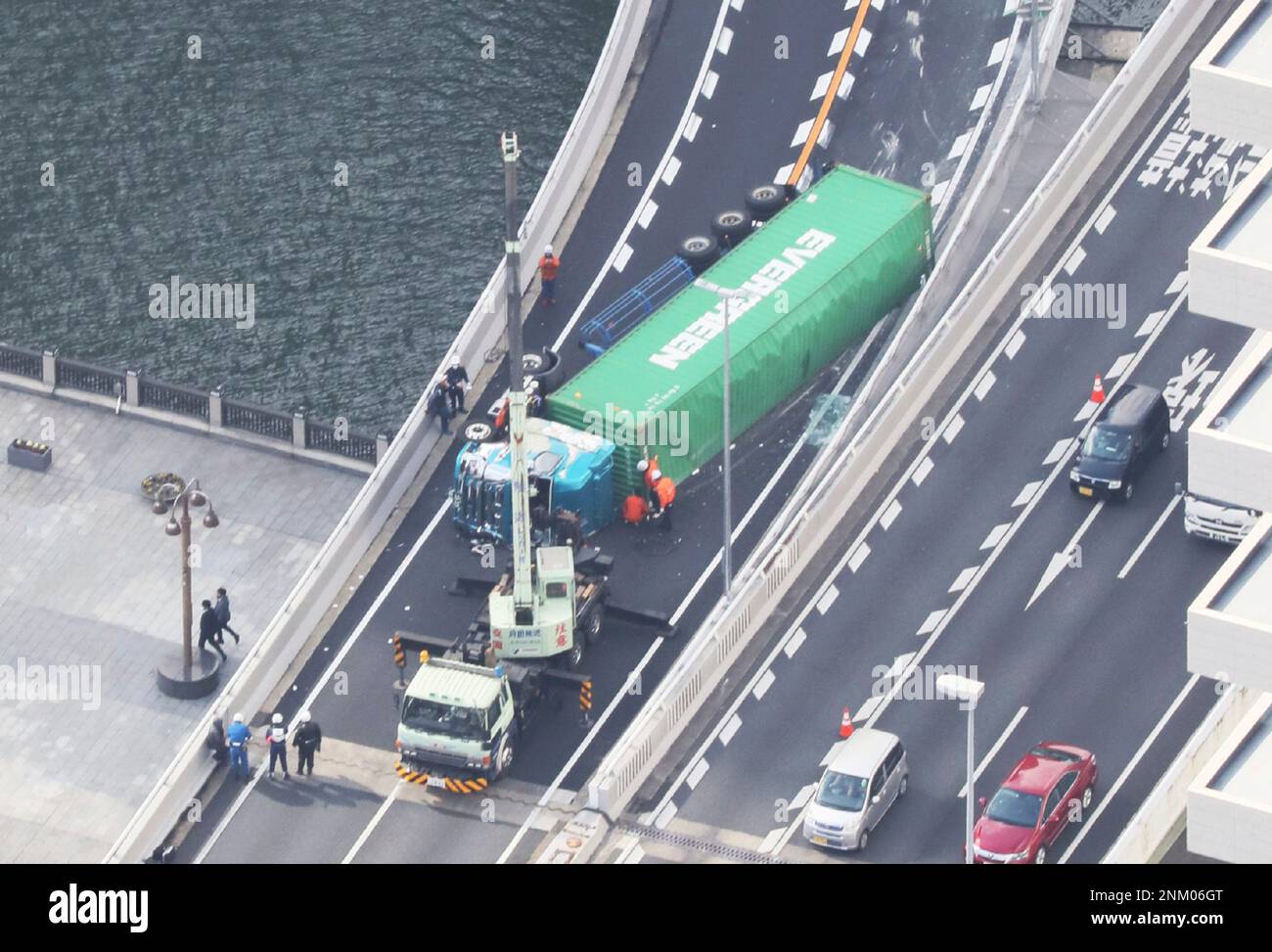 An aerial photo shows trailer having overturned at the junction of the ...