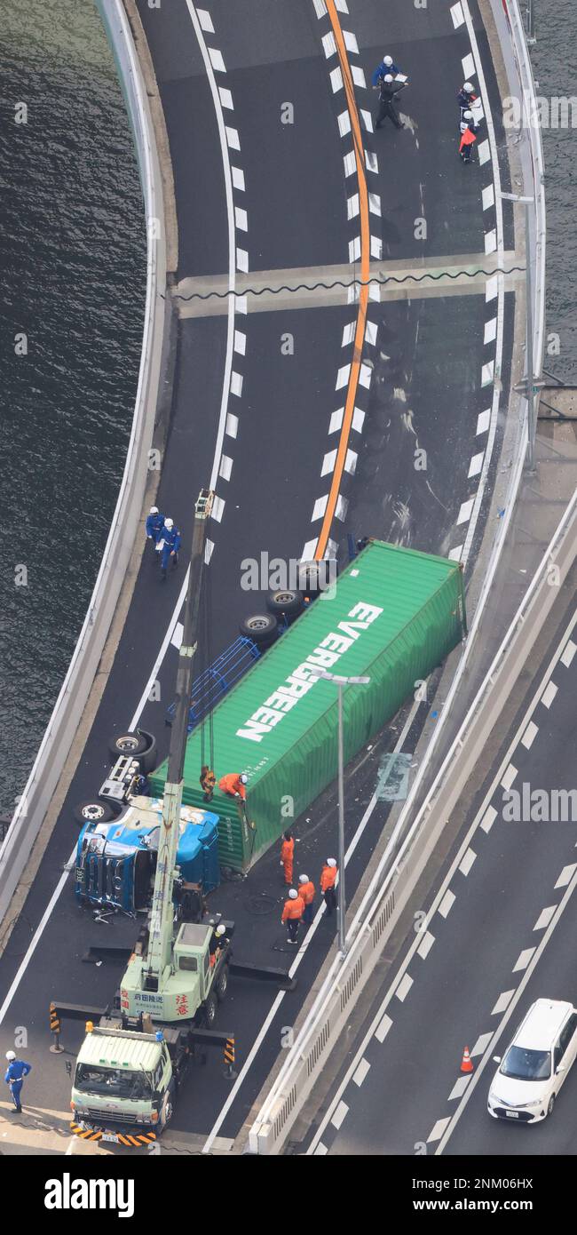An aerial photo shows trailer having overturned at the junction of the ...