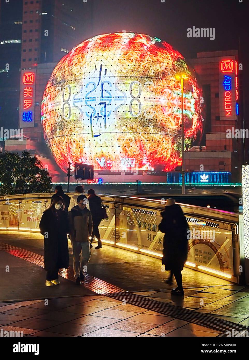 A global screen, made of 3,888 4K screens, shows a 3D program on top of ...