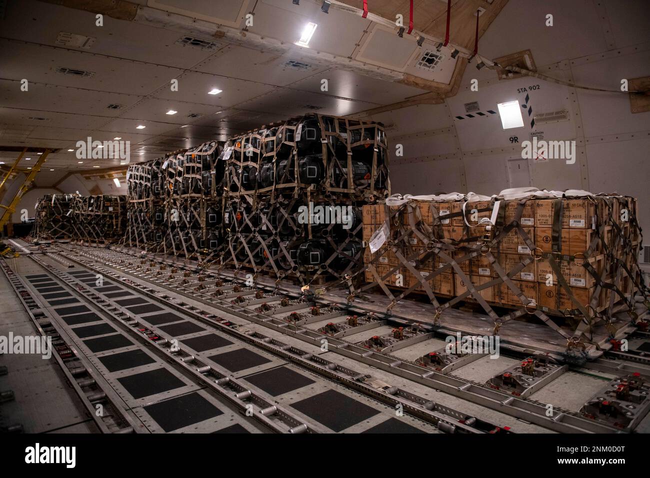 In this image provided by the U.S. Air Force, pallets of ammunition ...